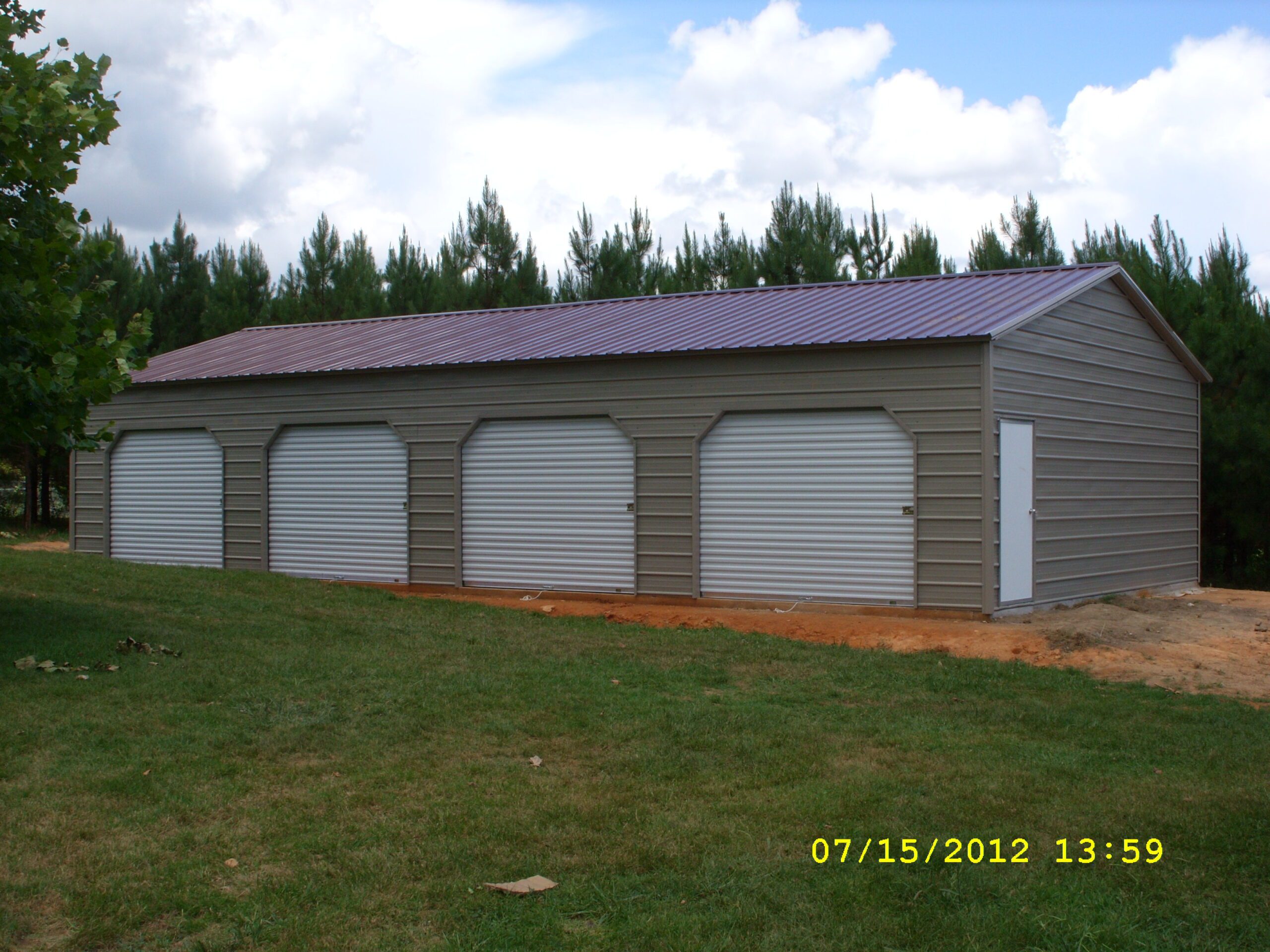A Frame Sidewinder with vertical roof, four rollup doors with dutch ...